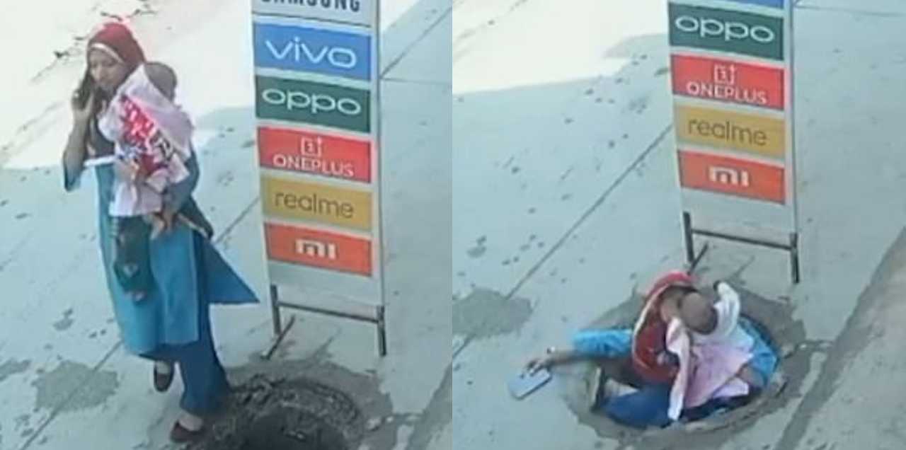 WATCH: Woman Talking On The Phone Falls Into A Manhole Along With Her Baby